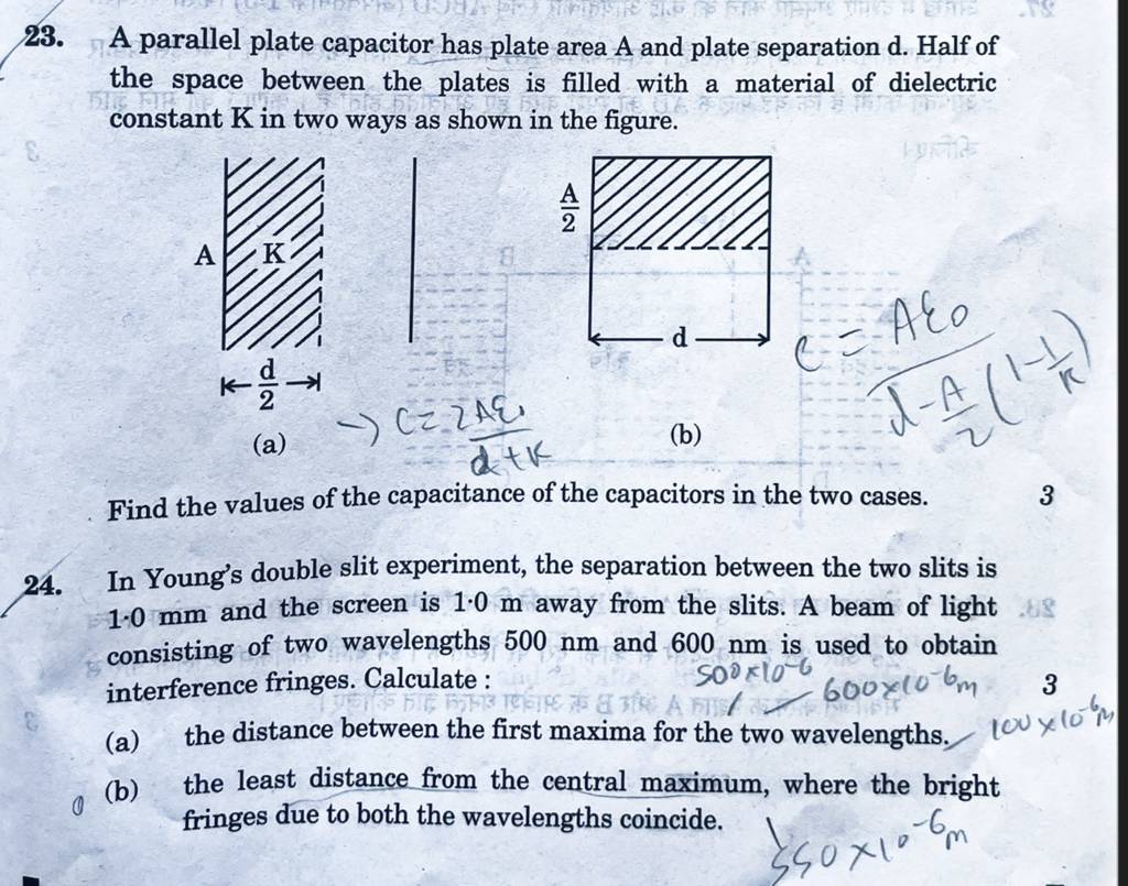 A parallel plate capacitor has plate area A and plate separation d. Half