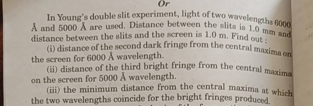 In Young's double slit experiment, light of two wavelengths 6000 A˚ and 5..