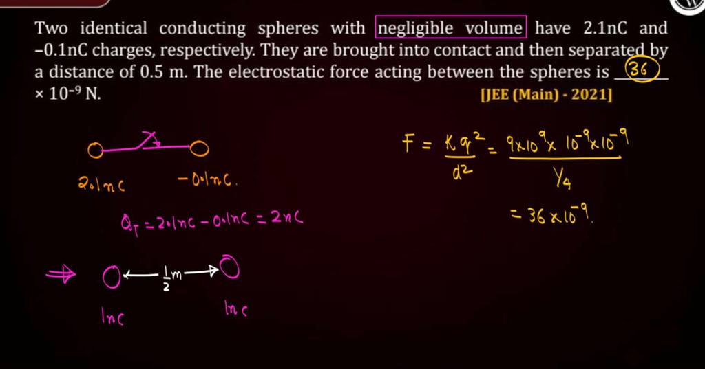 Two identical conducting spheres with negligible volume have 2.1 nC and