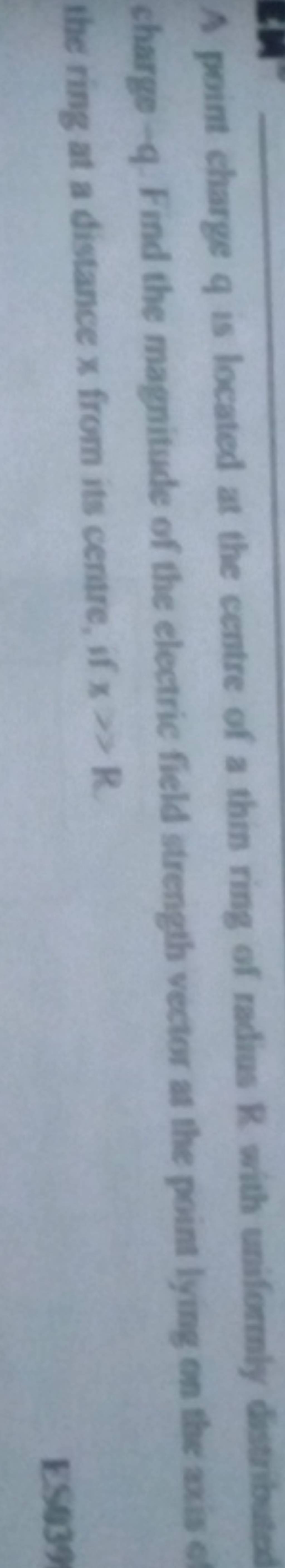 A point charge q is located at the centre of a thin ring of radius R with..
